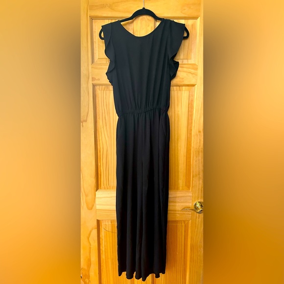 Aritzia | Pants & Jumpsuits | Aritzia Black Flowy Jumpsuit Size M ...